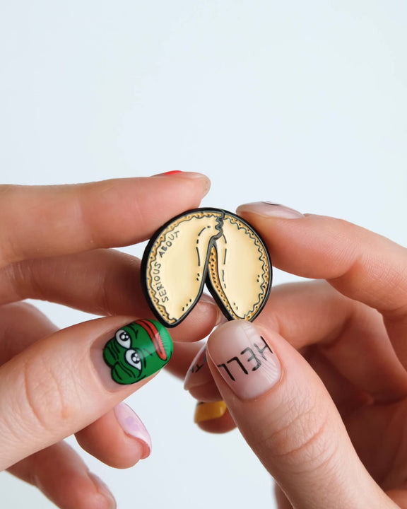 FORTUNE COOKIE, SLIDING ENAMEL PIN – SERIOUS ABOUT