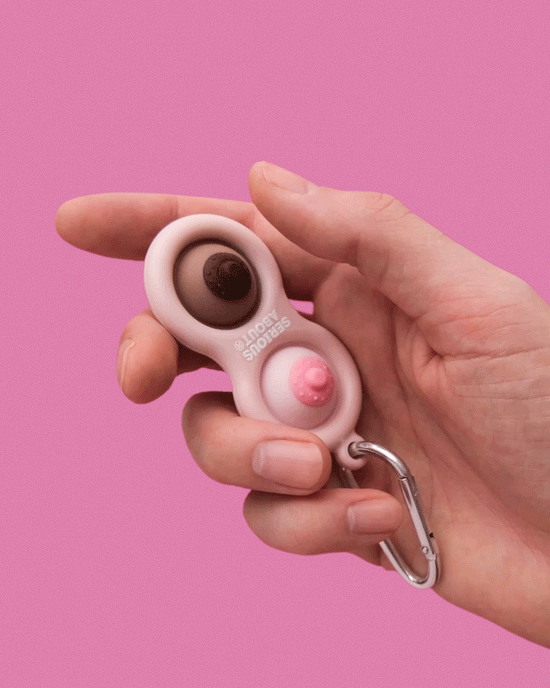 NIPPLE DIMPLE, pink frame, diverse buttons – SERIOUS ABOUT